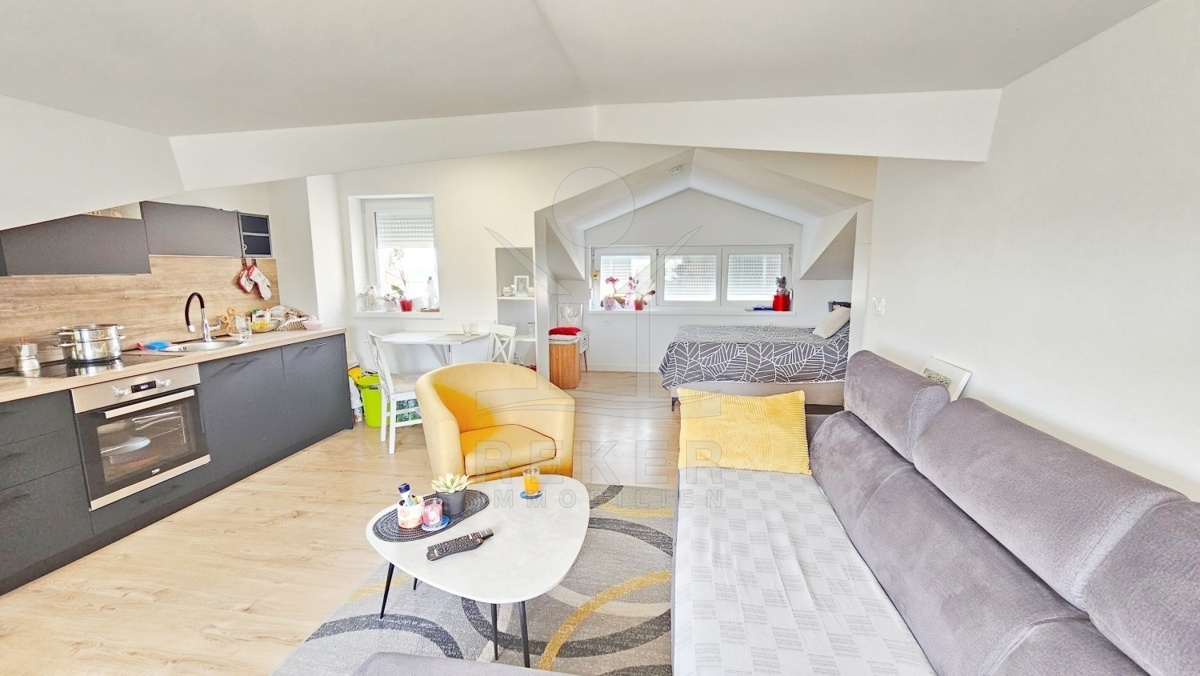 1-Zimmer-Apartment im Dachgeschoss mit Meerblick für Ihren perfekten ...
